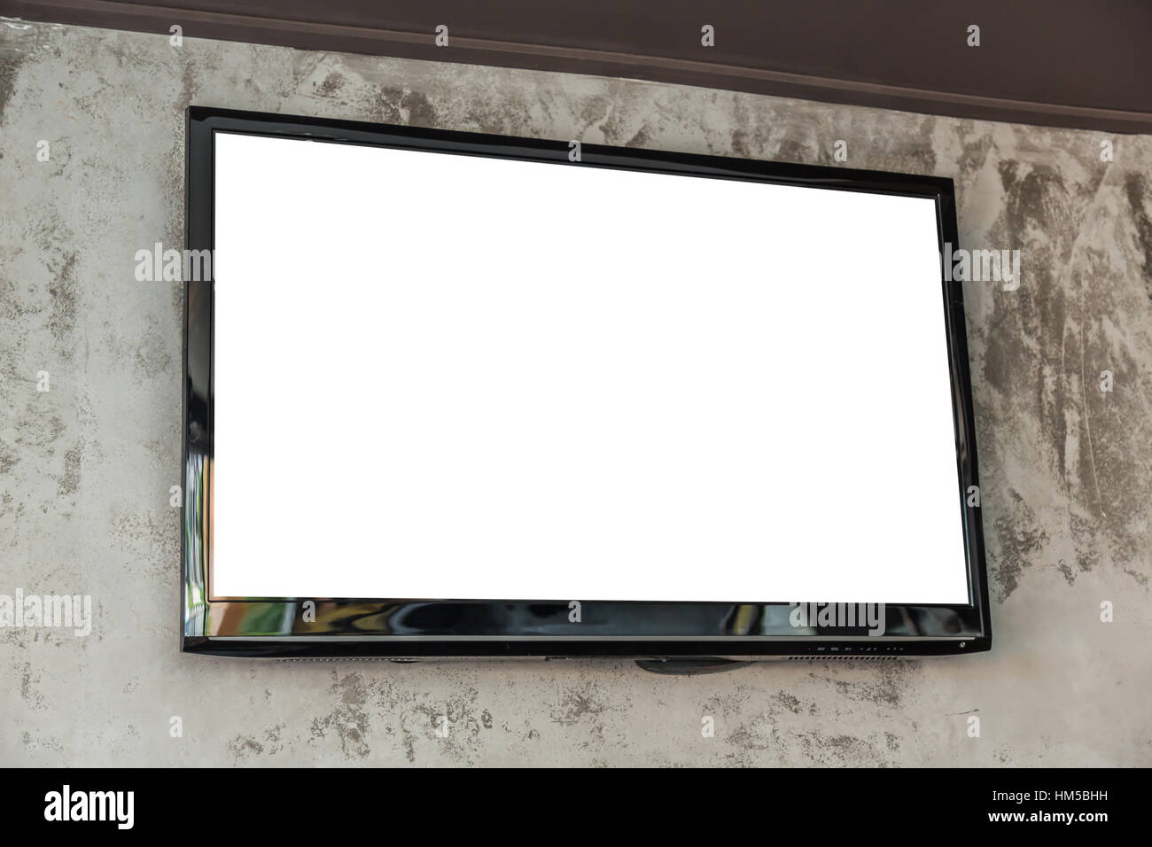 TV screen on wall Stock Photo - Alamy