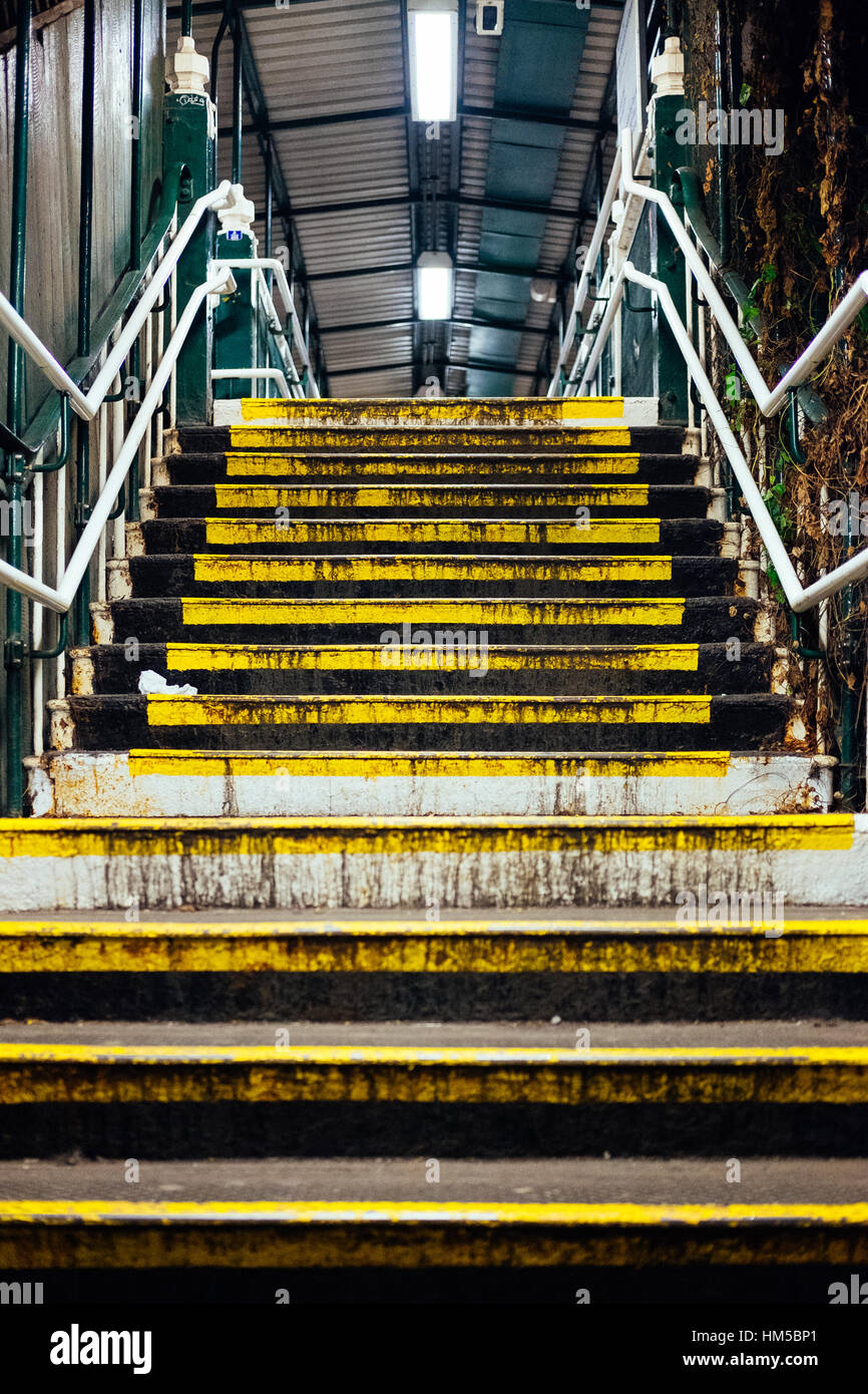 Looking up from the bottom of a train station staircase Stock Photo - Alamy