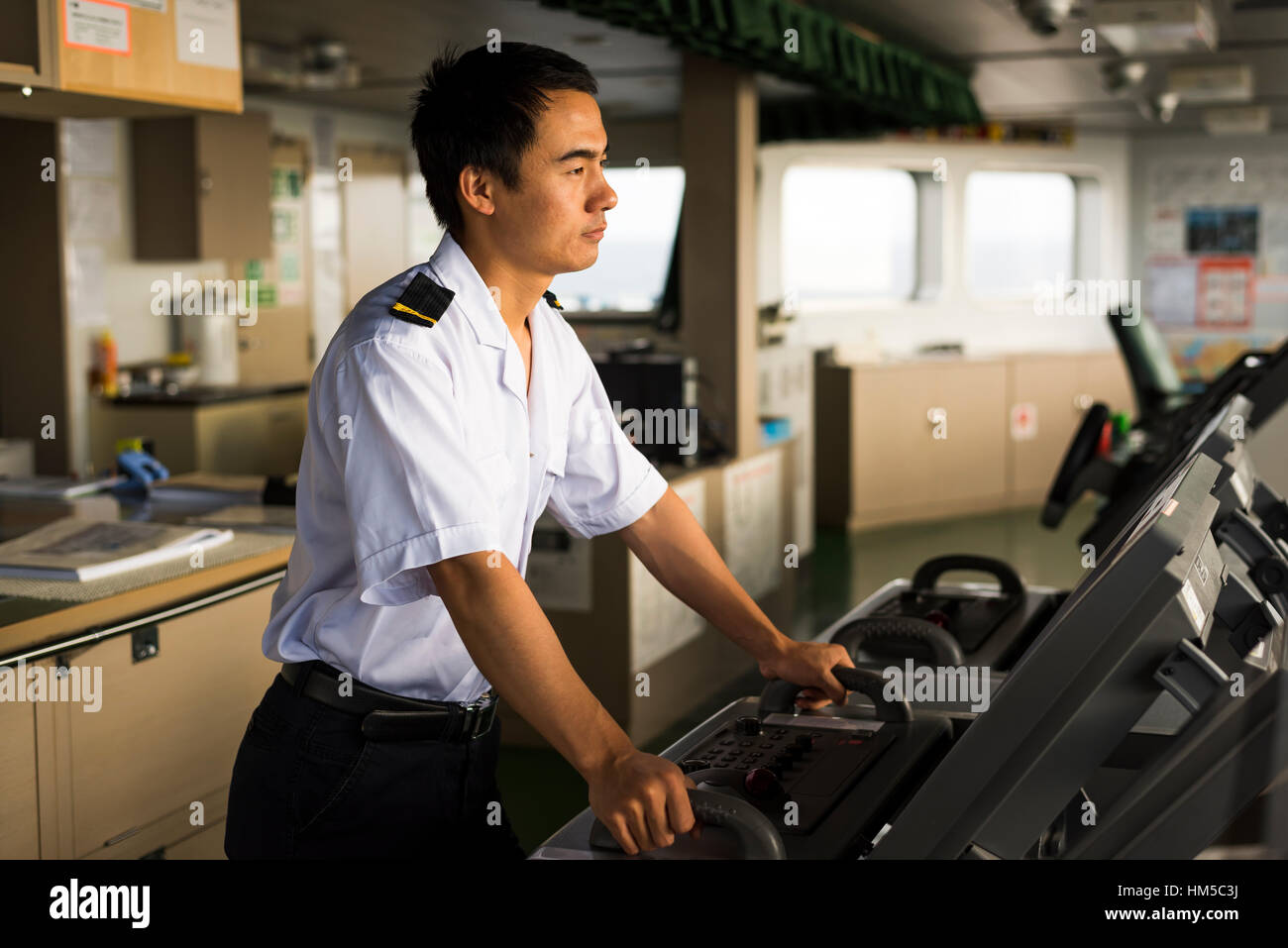 Ship captain bridge asian hi-res stock photography and images - Alamy