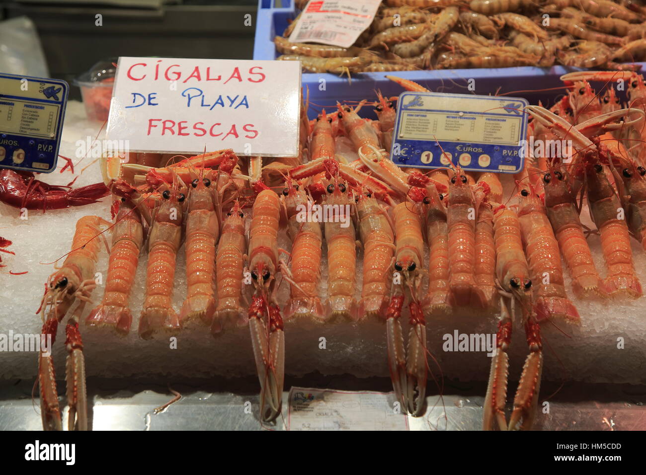 Food stalls selling fish inside central market building, city of ...