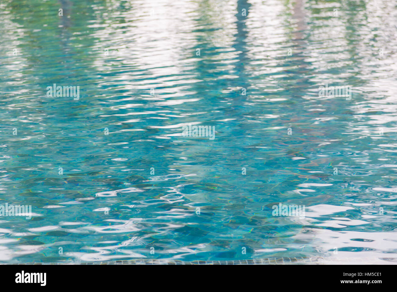 Swimming pool rippled water Stock Photo - Alamy