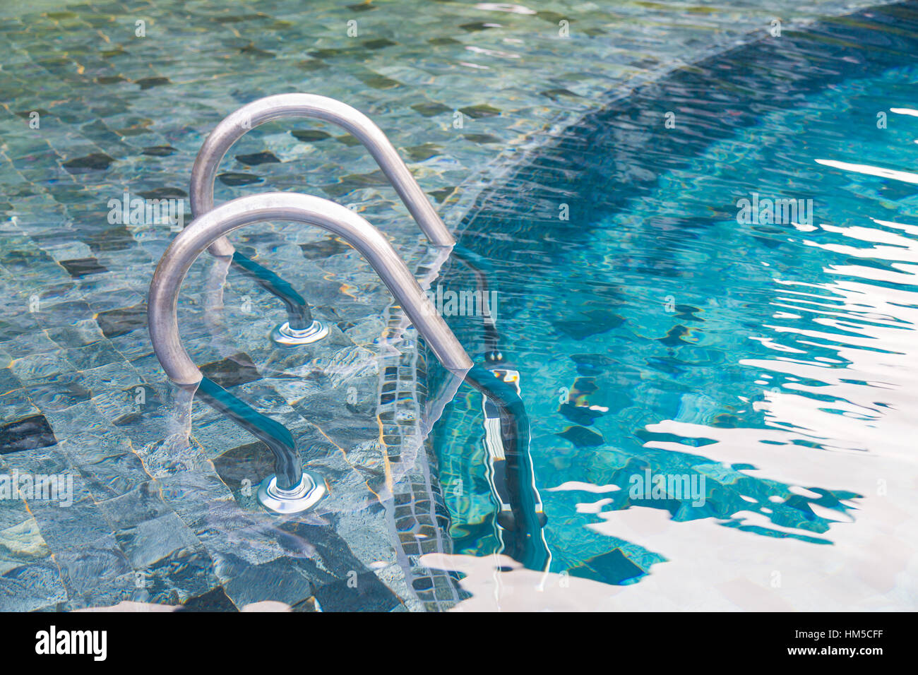 Swimming pool with stairs Stock Photo - Alamy