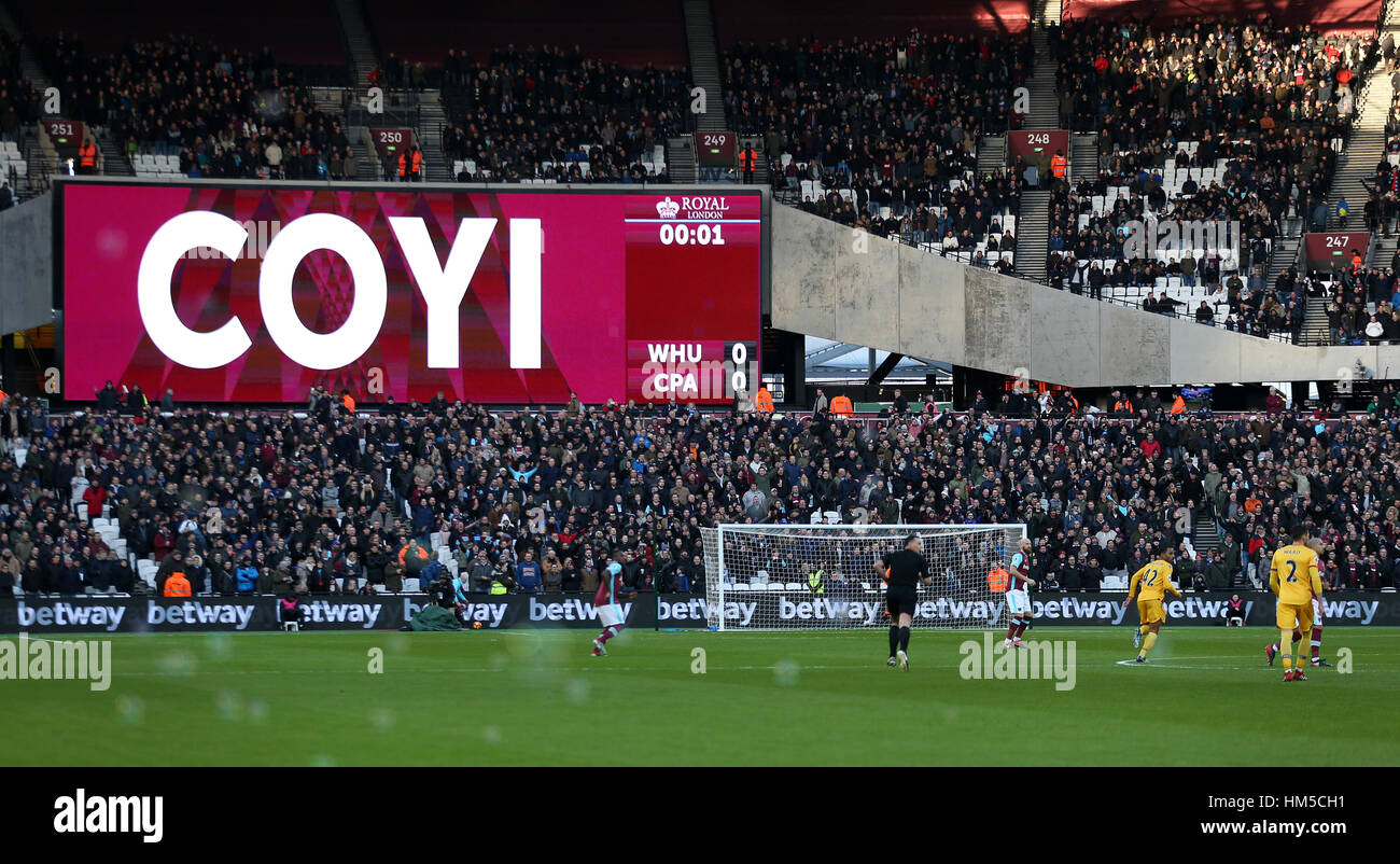 The big screen displays COYI (Come On You Iron) at kick-off Stock Photo ...