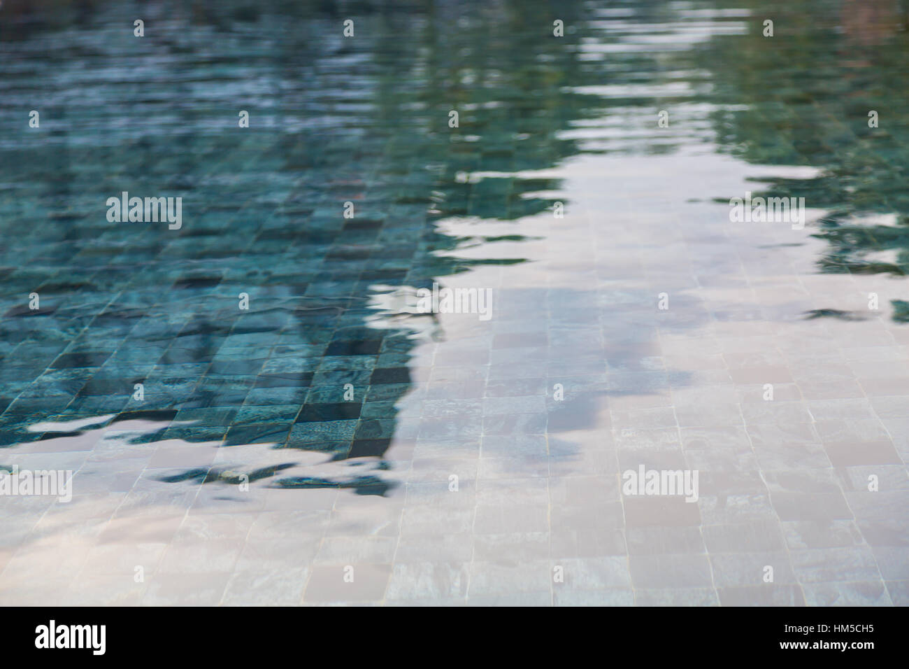 Swimming pool rippled water Stock Photo - Alamy