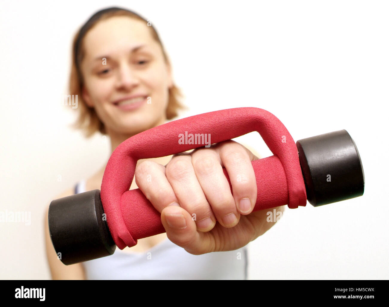 Woman trains muscles arms hi-res stock photography and images - Alamy