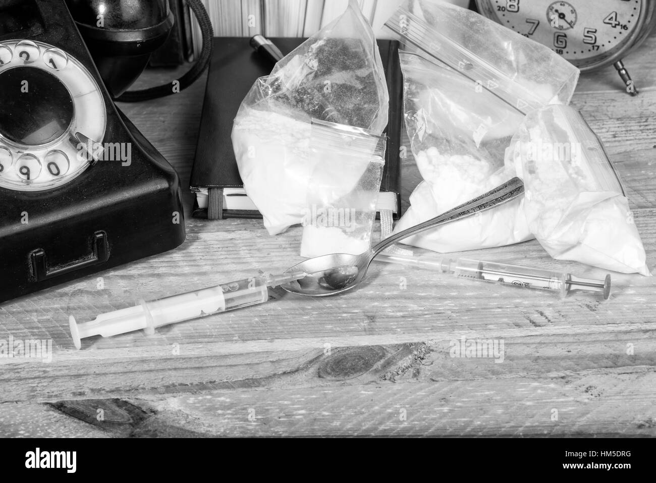 Drug syringe and cooked heroin Stock Photo - Alamy