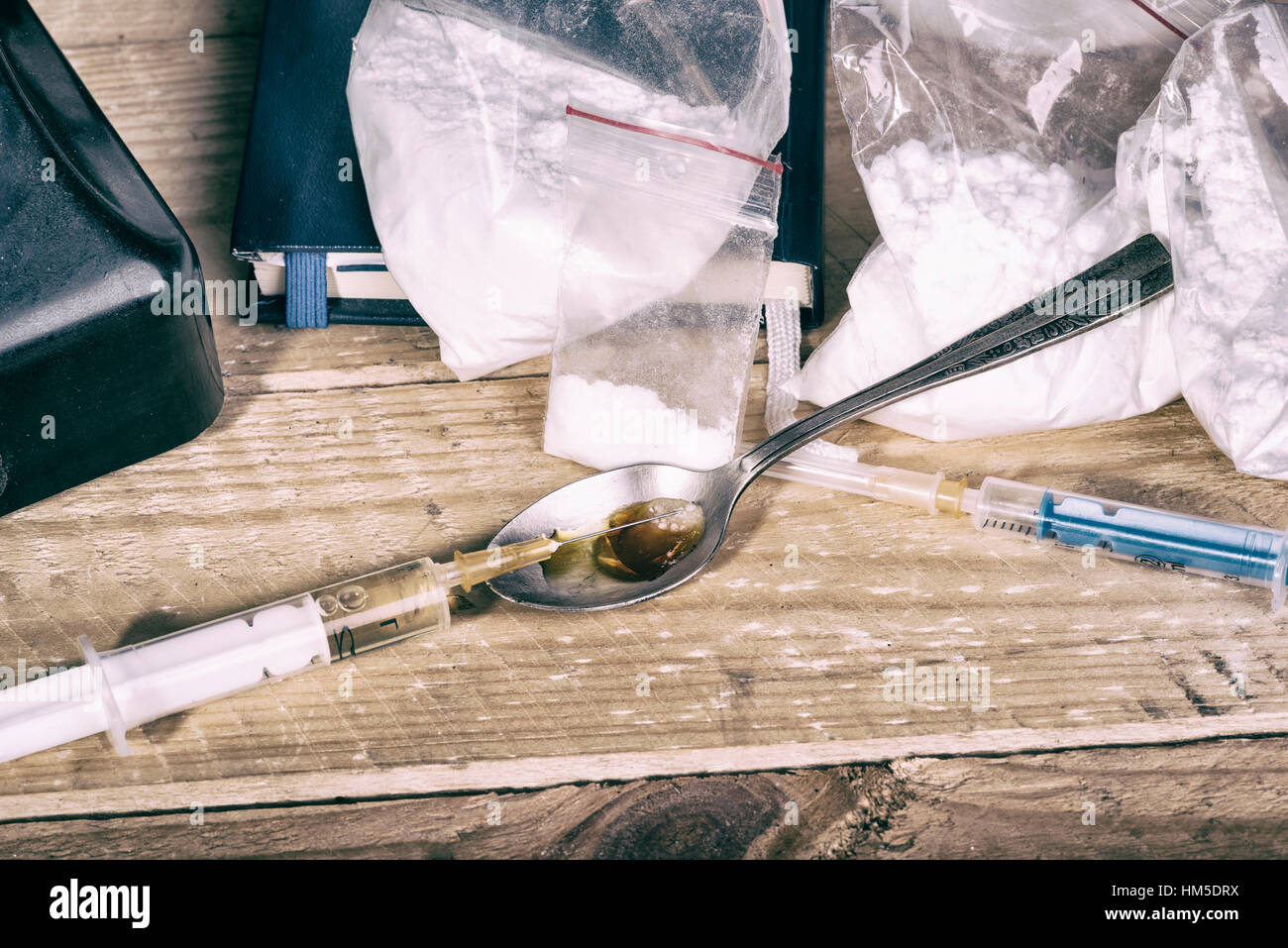 Drug syringe and cooked heroin Stock Photo - Alamy