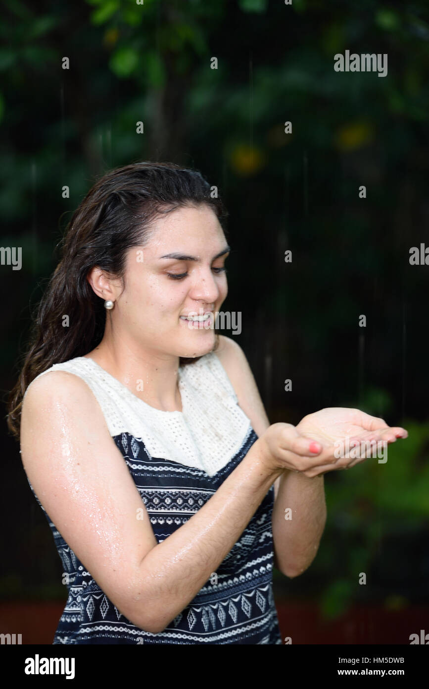 Girl catch rain hi-res stock photography and images - Alamy