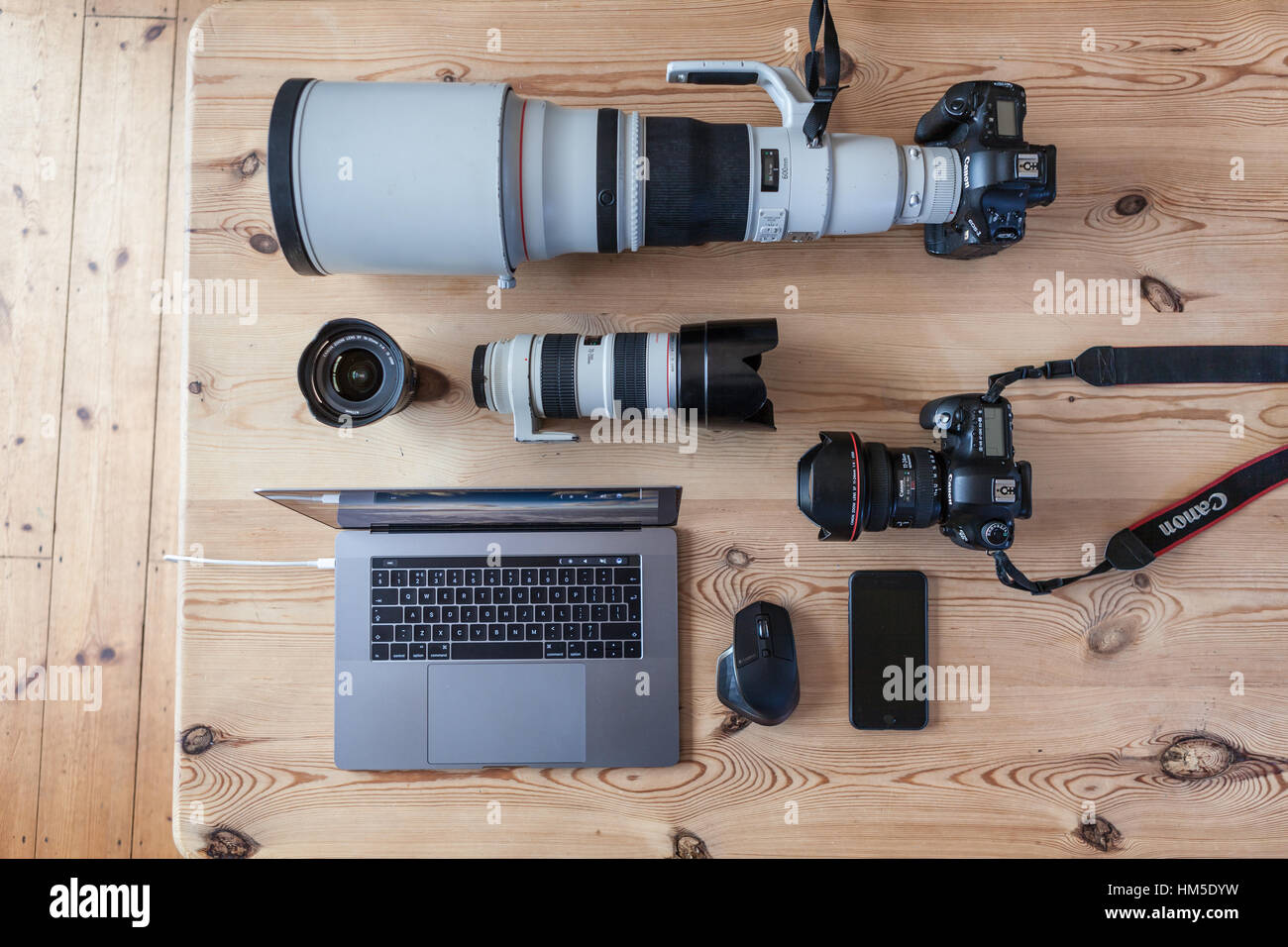 A selection of modern technology, camera equipment, computer equipment ...