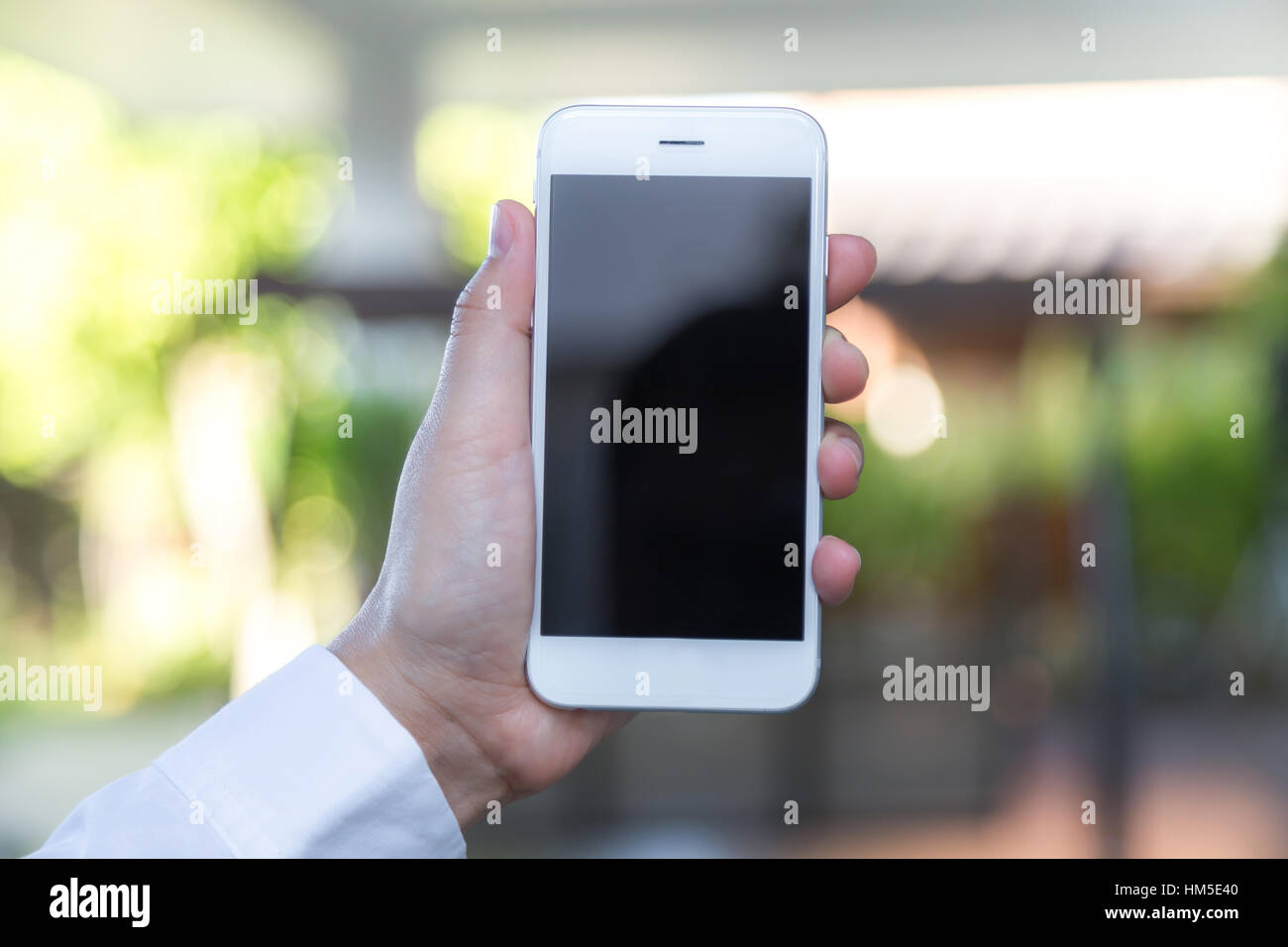 Hand hold Smart Phone Stock Photo - Alamy