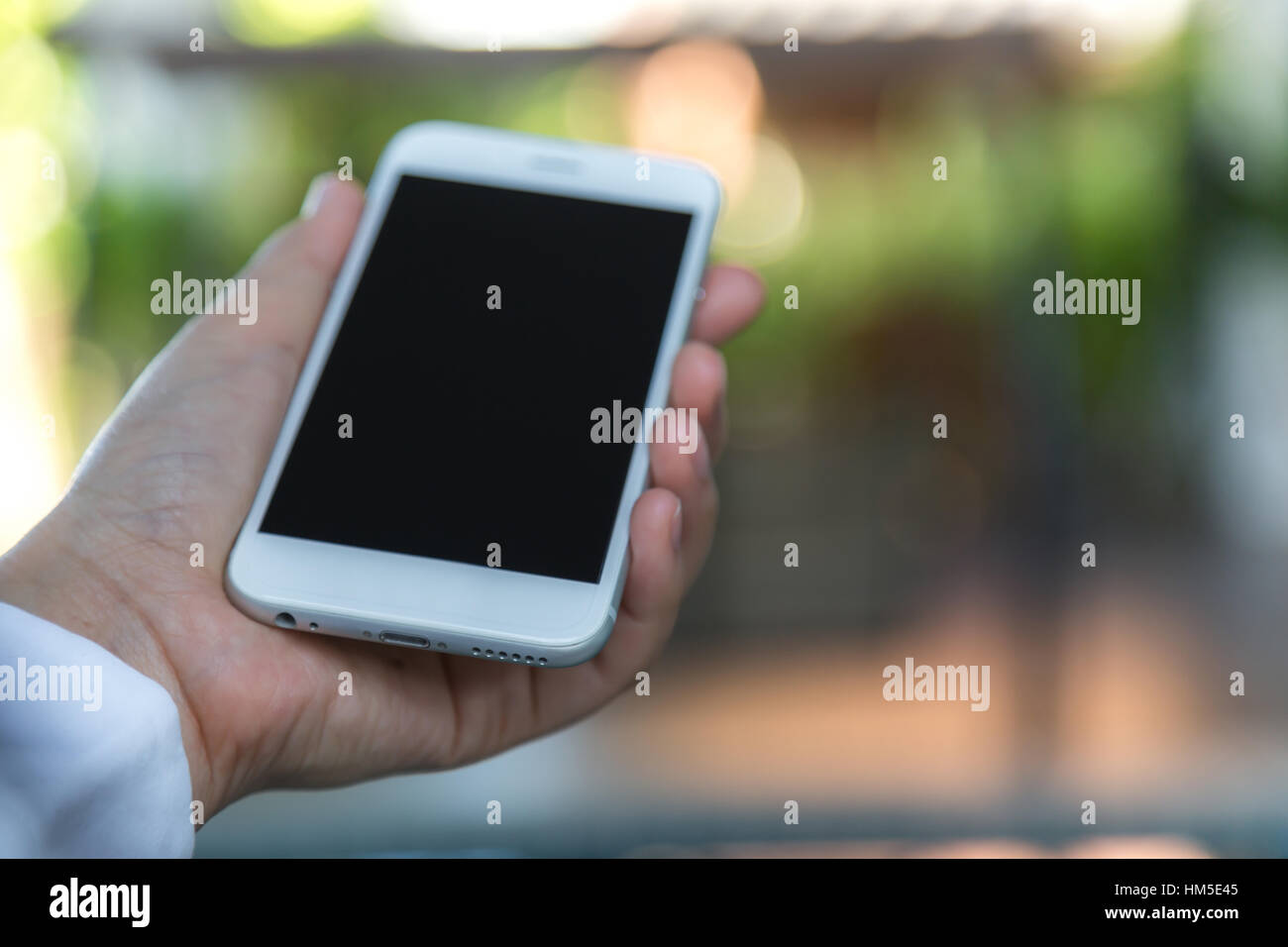 Hand hold Smart Phone Stock Photo - Alamy