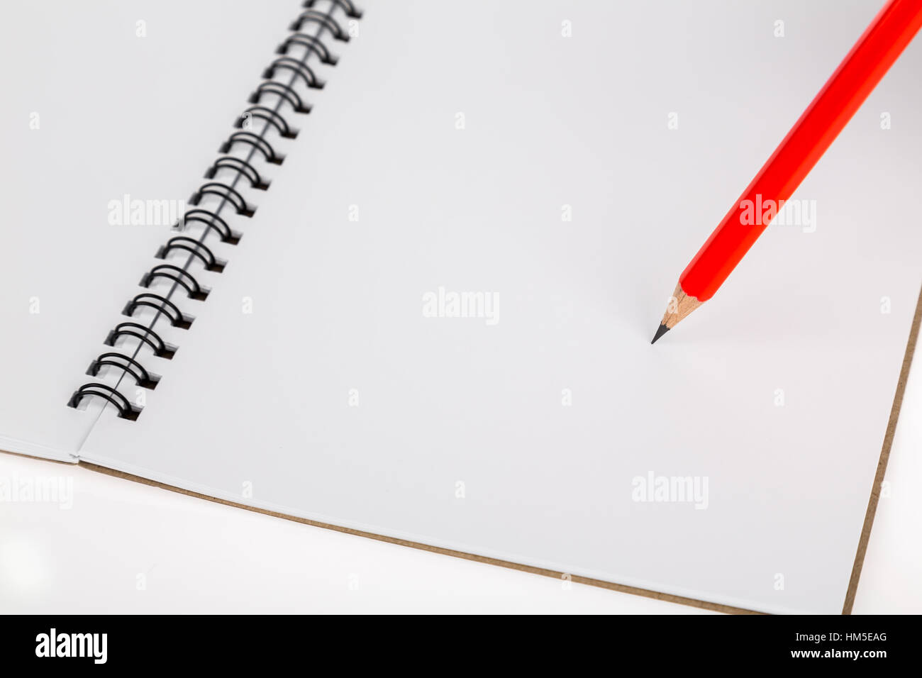 Pencil on notebook Stock Photo - Alamy