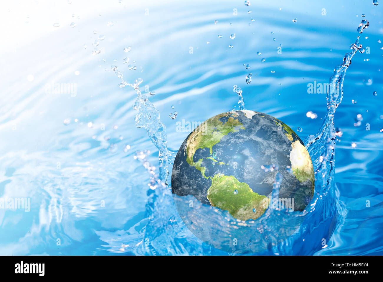 Earth falling into water (Elements of this image furnished by NASA ...