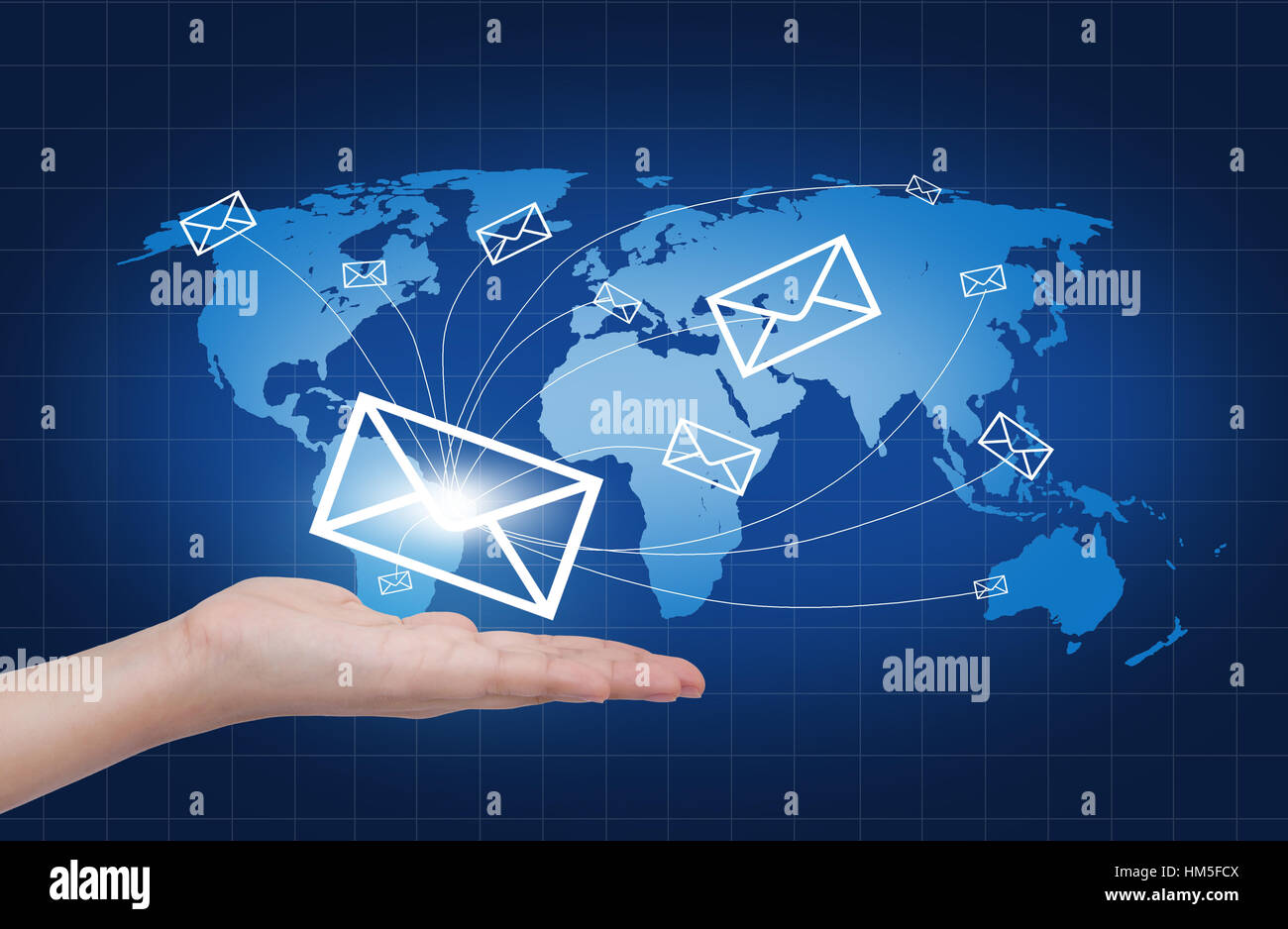 Hands with world mail delivery on world map background Stock Photo - Alamy