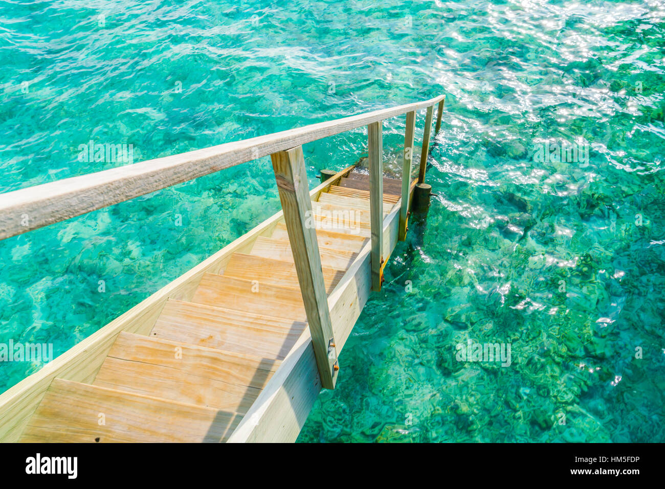 Wood stair into the sea of tropical Maldives island Stock Photo - Alamy