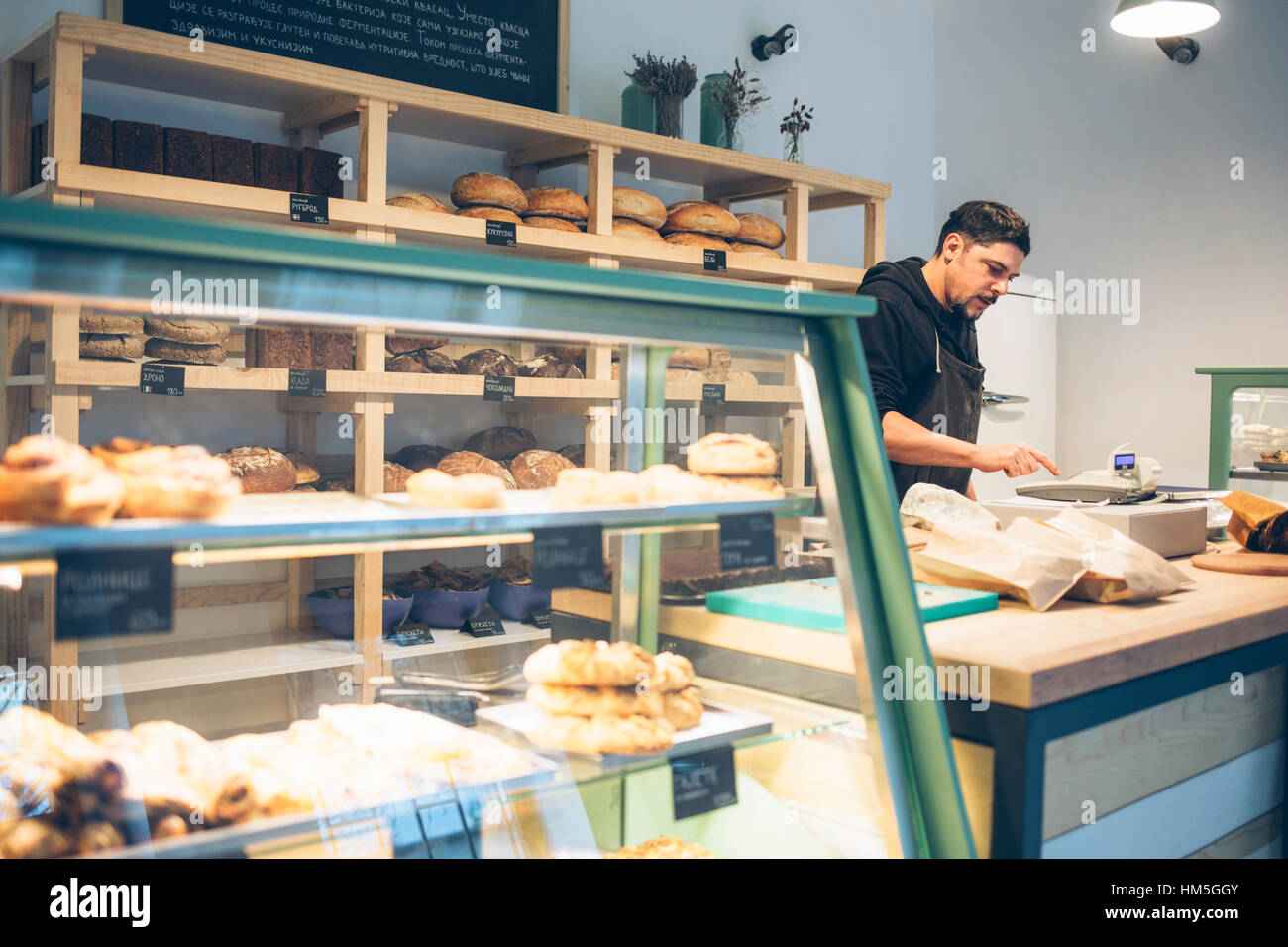 Male owner working bakery hi-res stock photography and images - Alamy