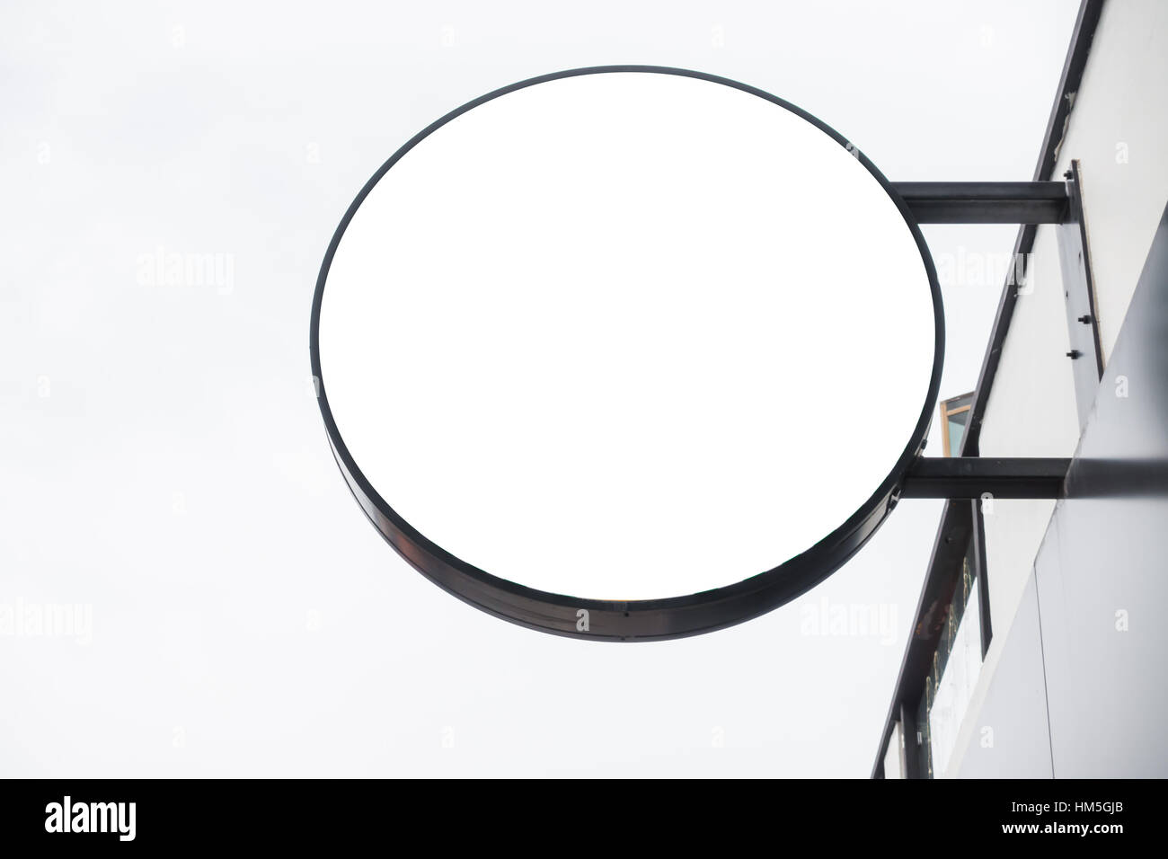 Round shop sign mock up Stock Photo - Alamy