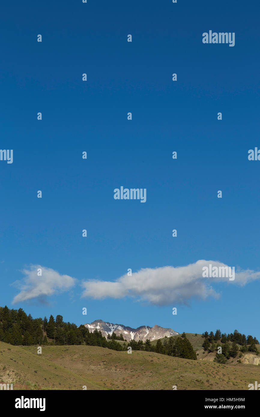Mountain ridge line with clouds and empty sky Stock Photo - Alamy