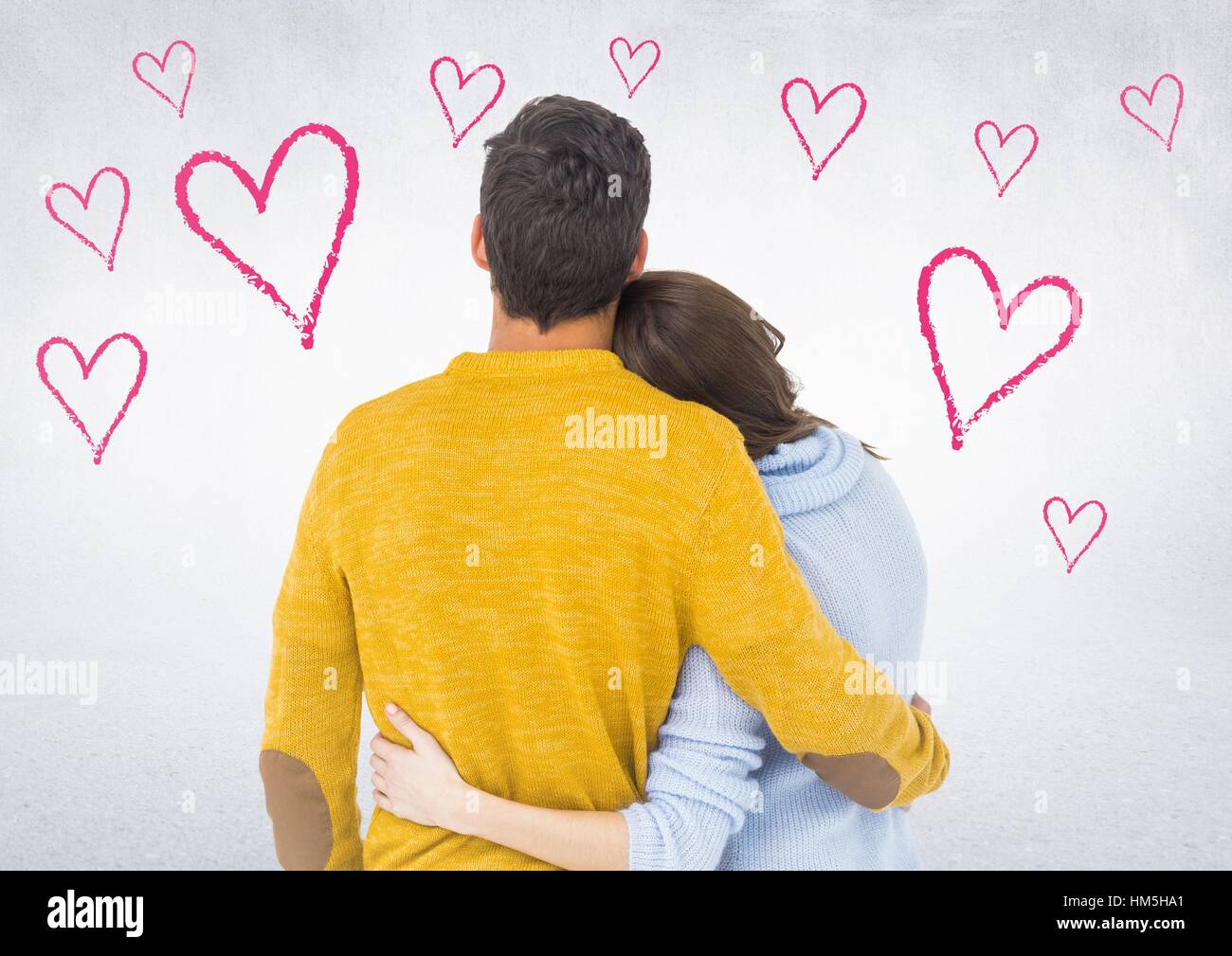 Composite image of couple embracing each other Stock Photo - Alamy