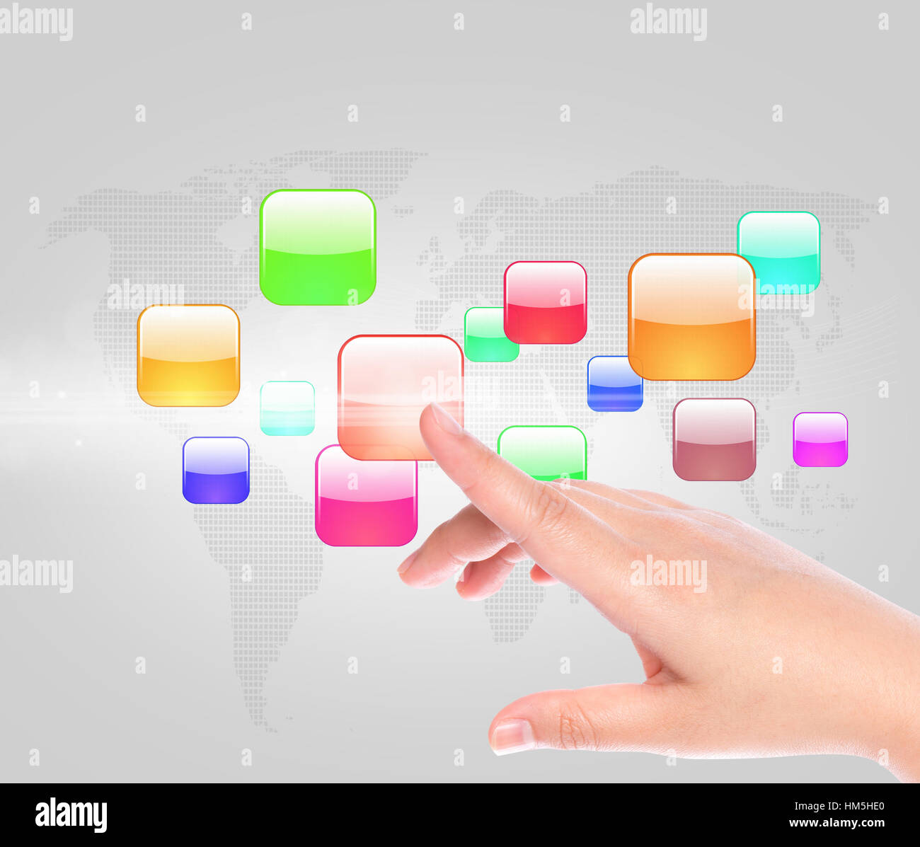 Hand on the flow of several colorful button Stock Photo - Alamy