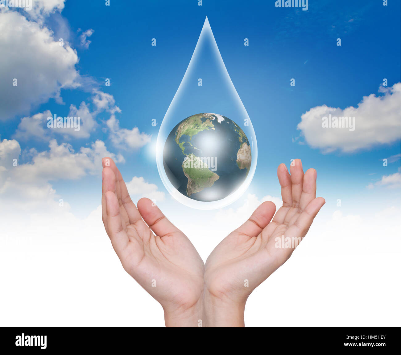 Eco concept : Hand with earth in water drop Stock Photo - Alamy