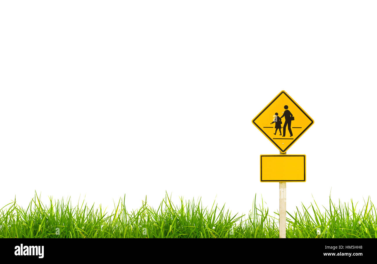 Traffic sign (School warning sign) on grass Stock Photo - Alamy