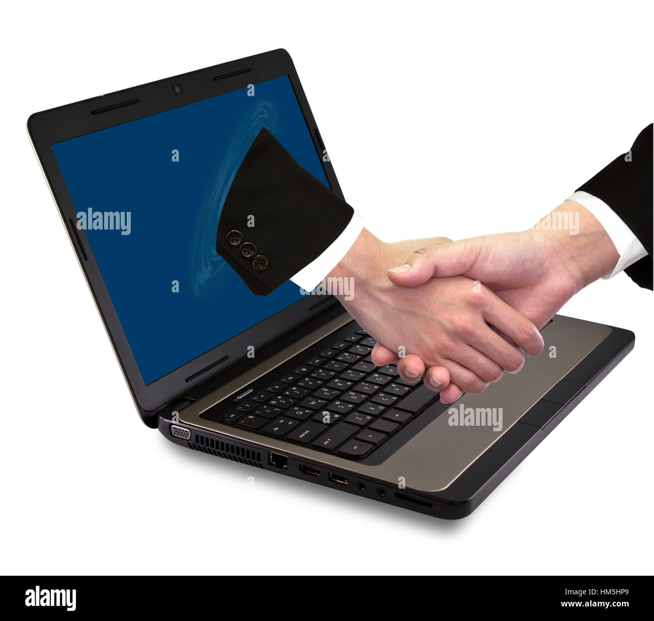 Businessmen shake hands from laptop Stock Photo - Alamy
