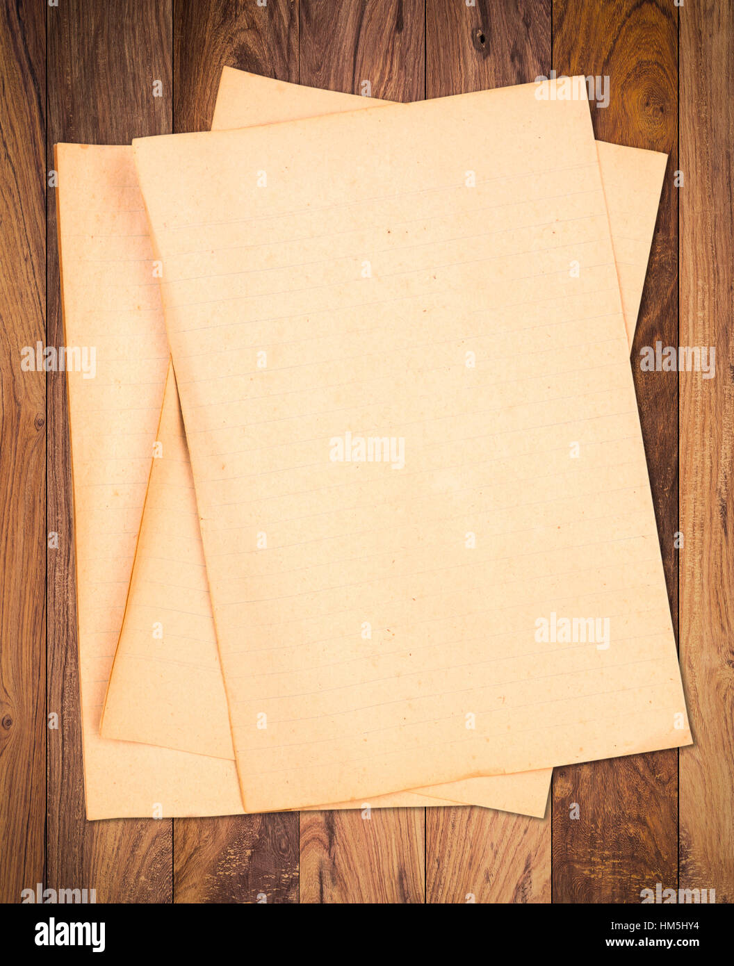 Old paper on wood Stock Photo - Alamy