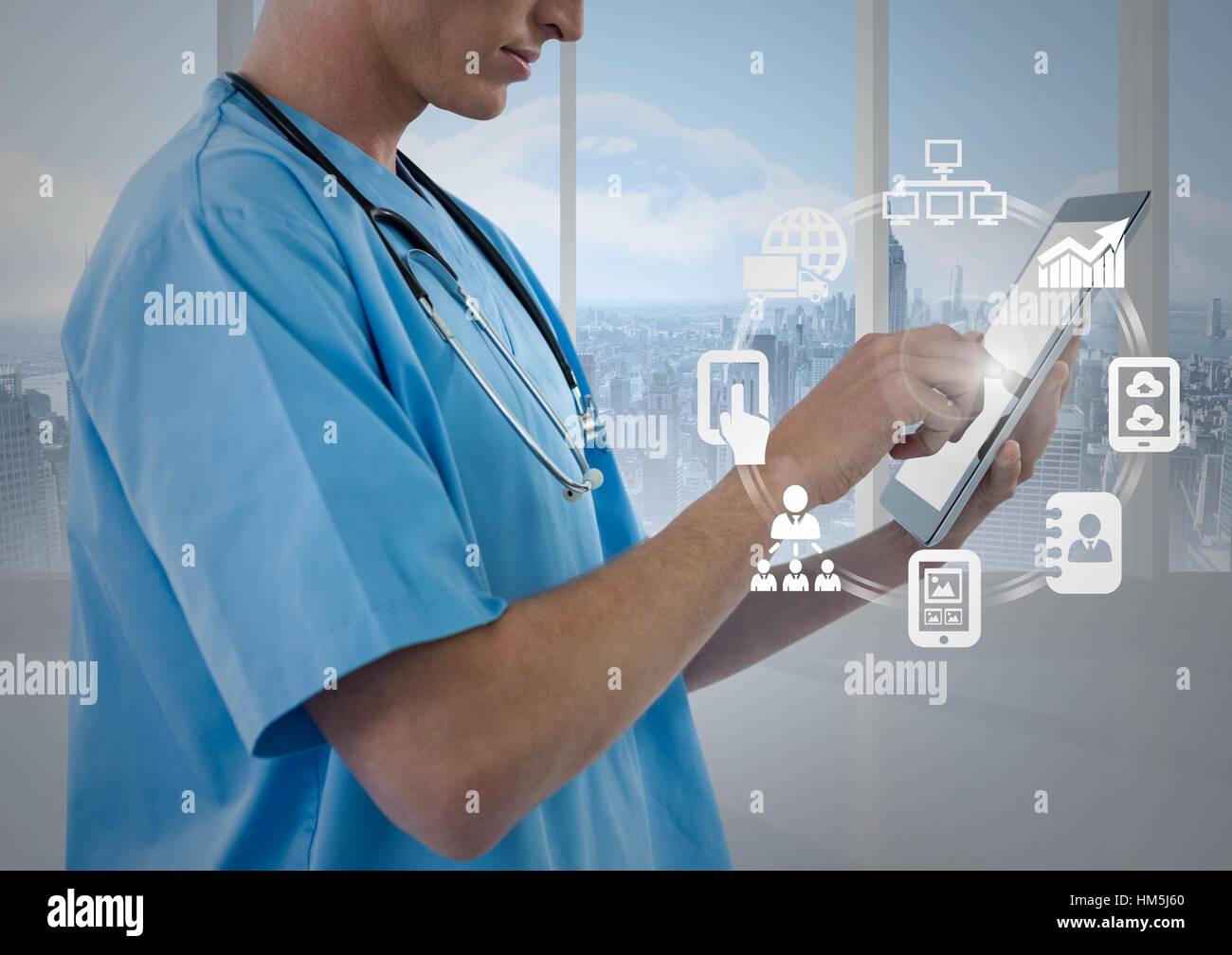 Male nurse using digital tablet with app icon interface screen Stock ...