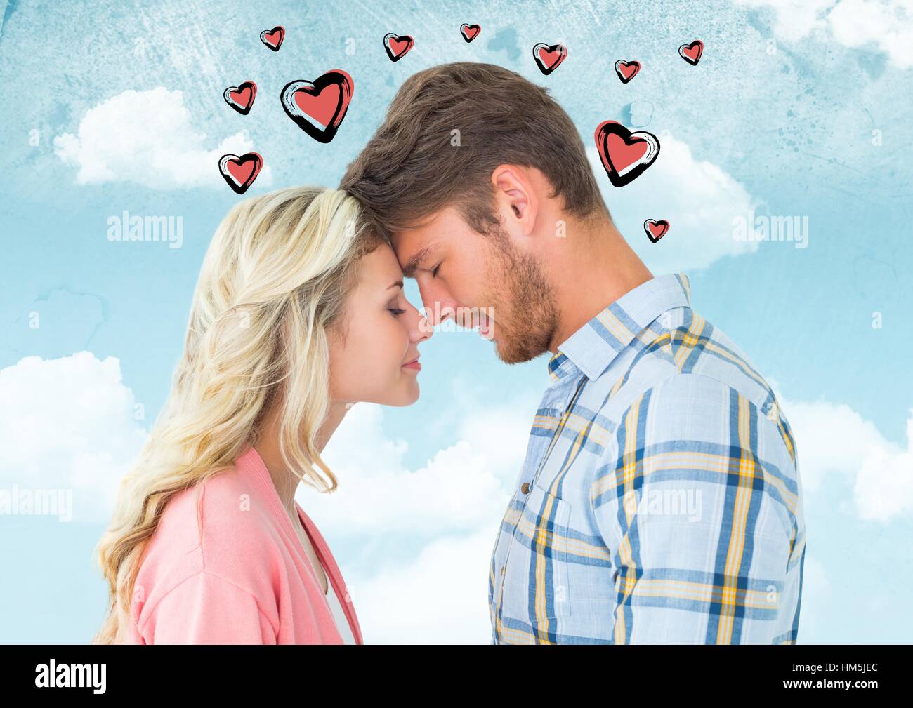 Romantic couple embracing face to face Stock Photo - Alamy