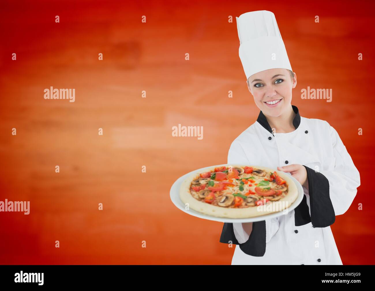 Female chef holding pizza hi-res stock photography and images - Alamy
