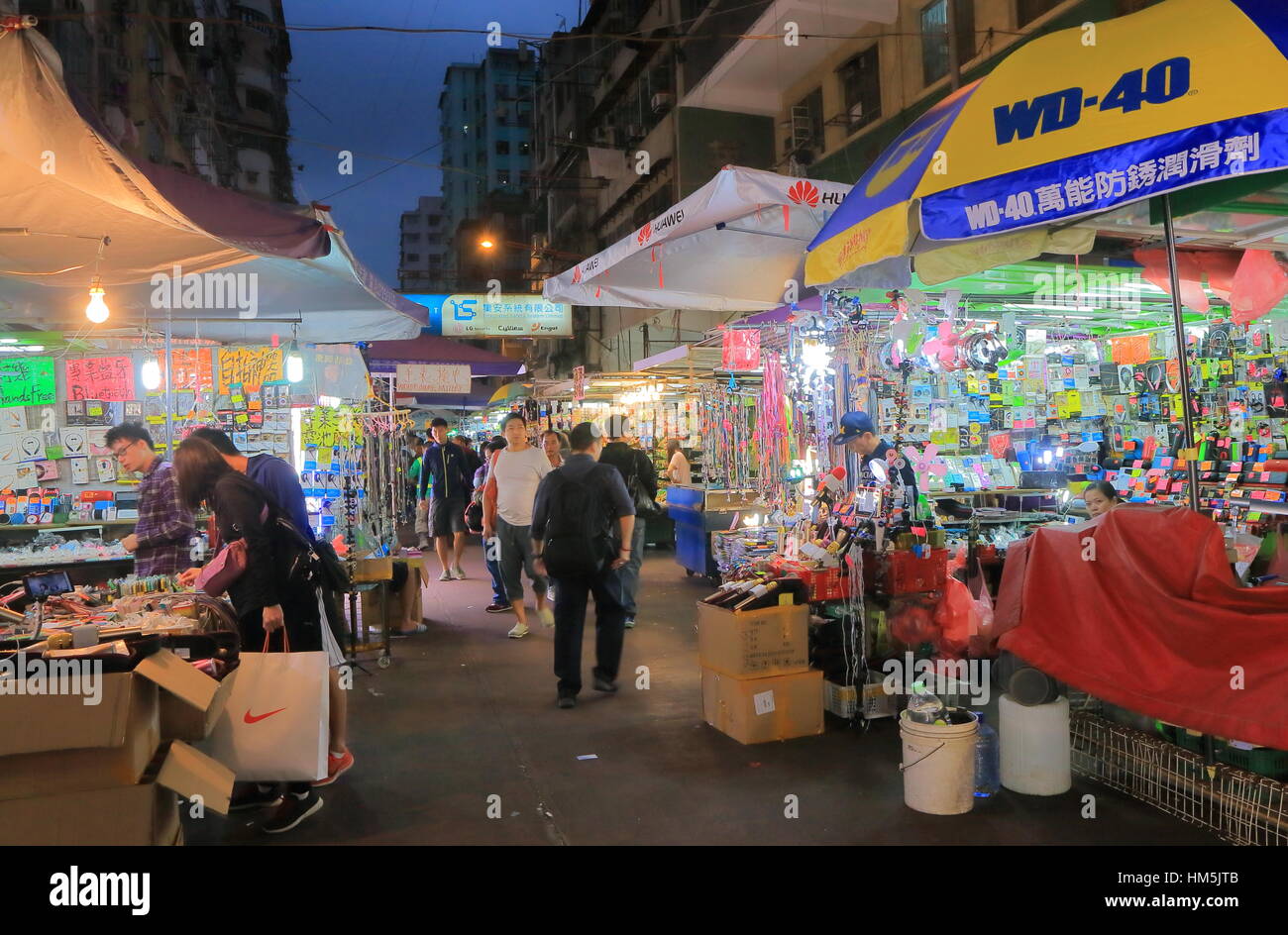 People visit Apliu street market in Hong Kong. Apliu street is famous ...