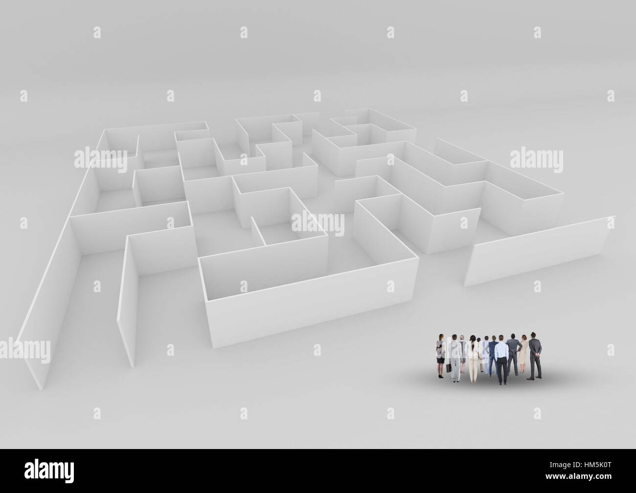Businesspeople standing at the entrance of maze Stock Photo - Alamy