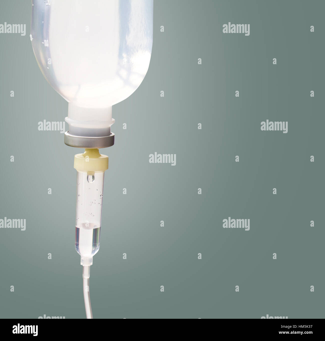 Infusion bottle with IV solution on white background with copy space ...