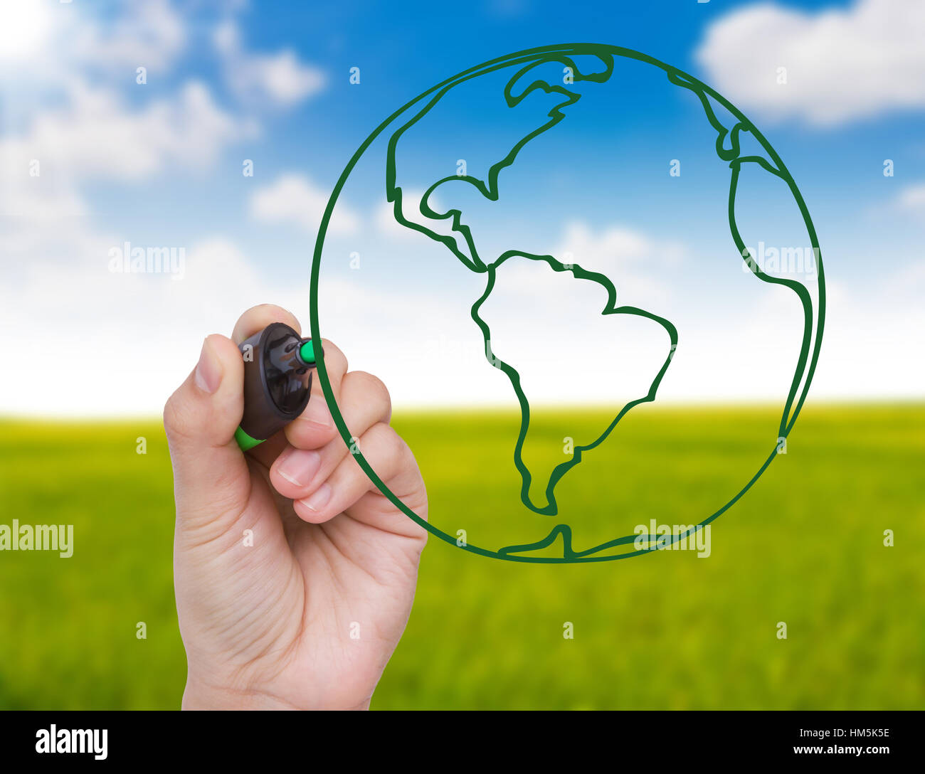 Woman's hand writing " World Stock Photo - Alamy