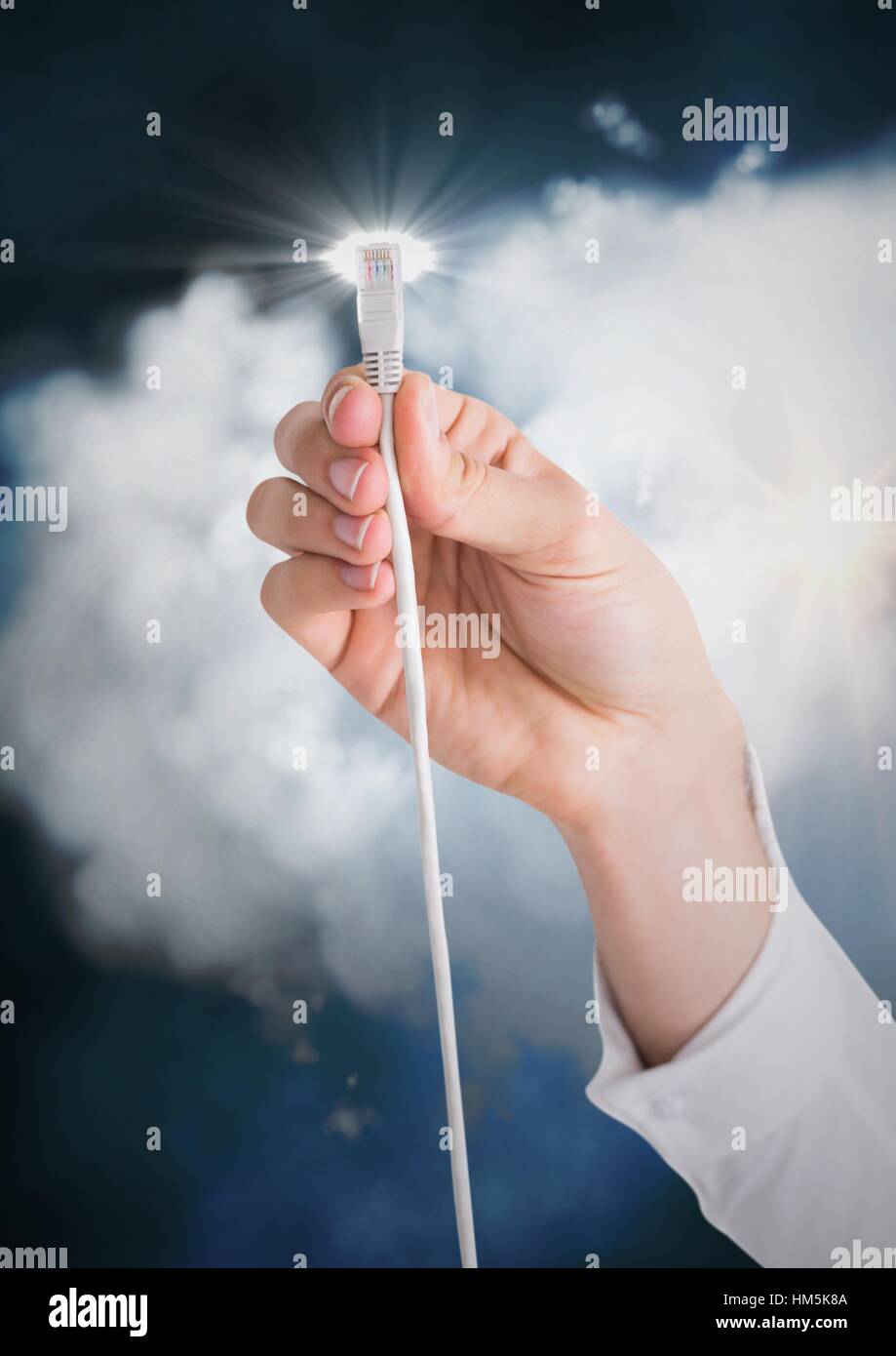 Human hand connecting cable to the cloud Stock Photo - Alamy