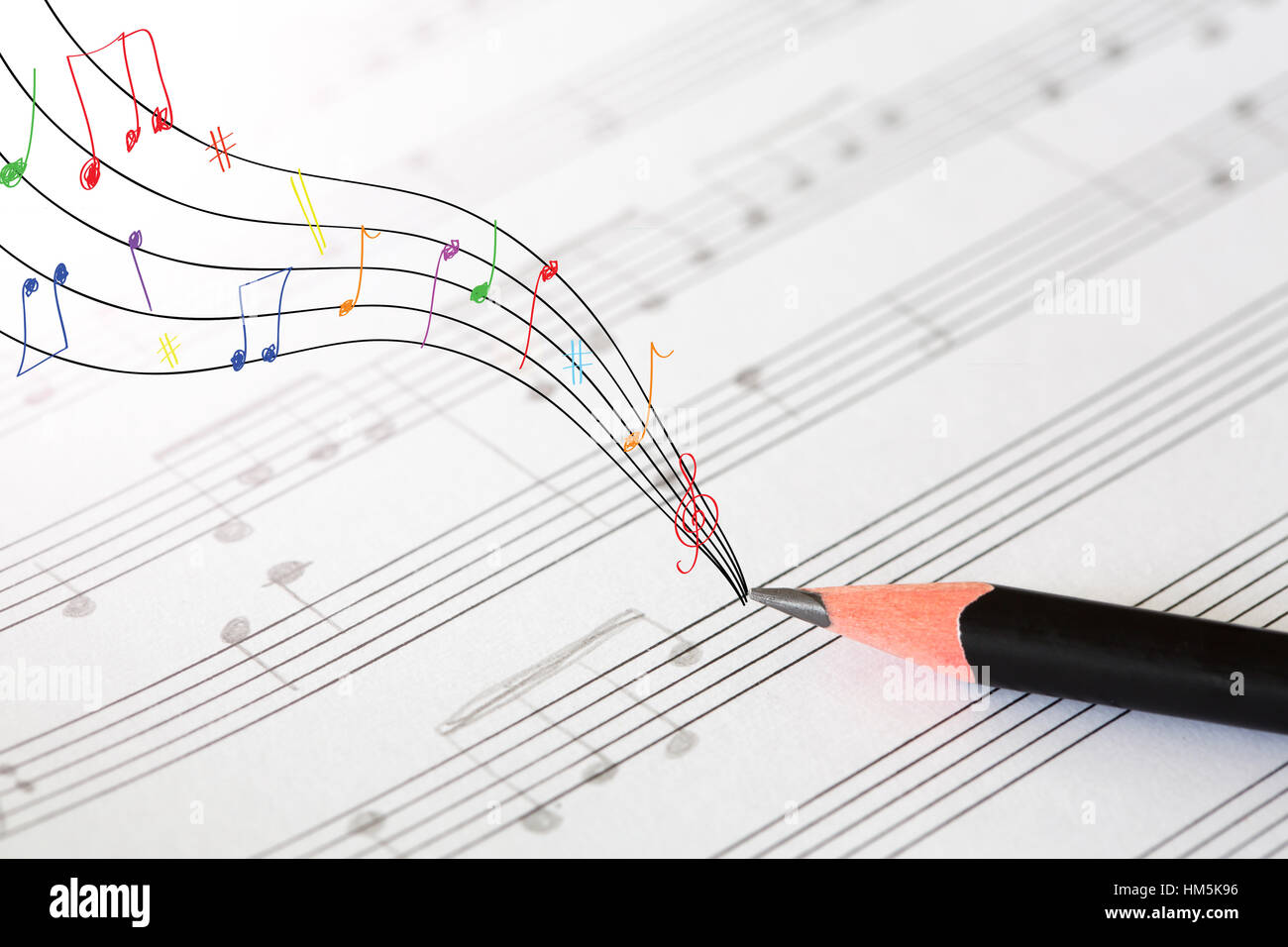 Pencil and music sheet Stock Photo - Alamy