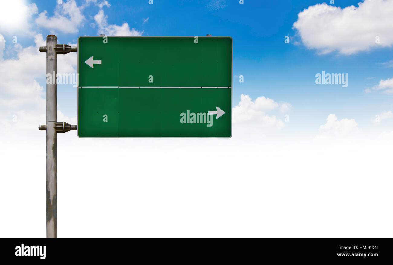 Green Traffic sign on blue sky Stock Photo - Alamy