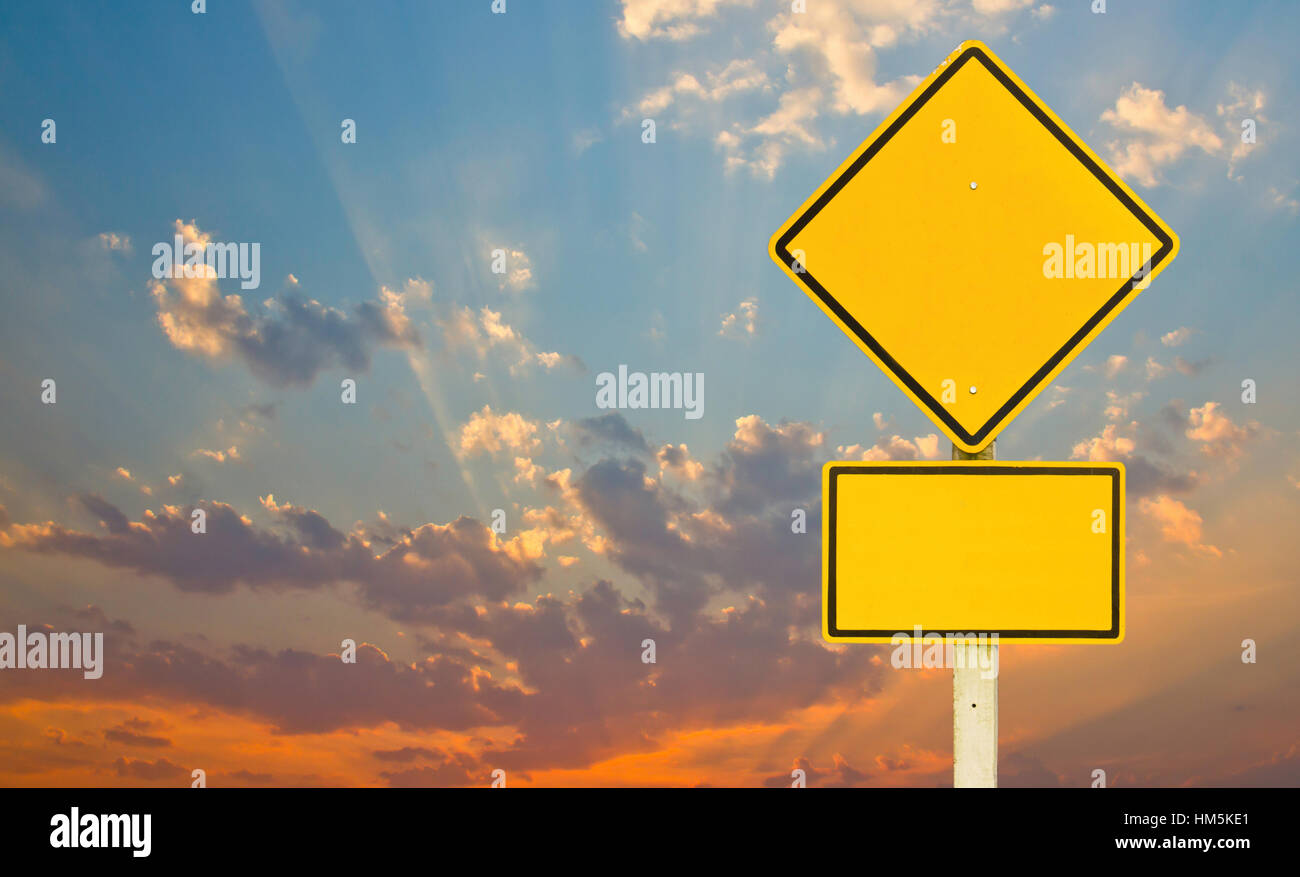 Traffic sign on sunset Stock Photo - Alamy