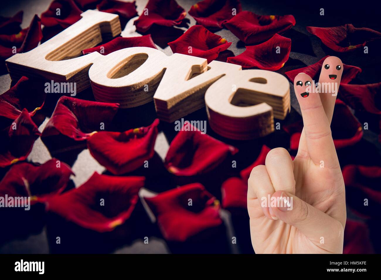 Happy finger face couple in love Stock Photo - Alamy