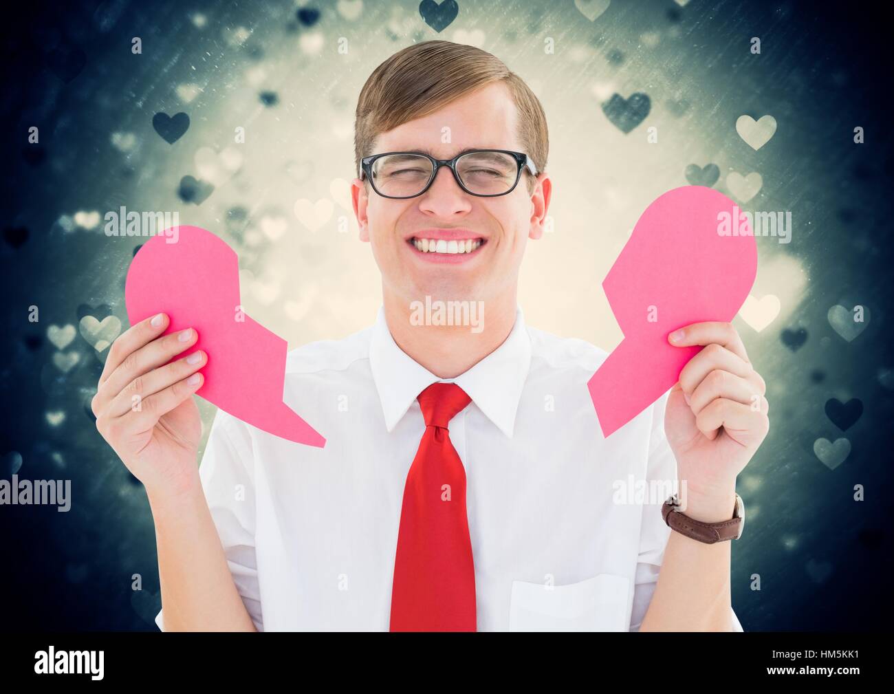 Crying man holding broken heart Stock Photo - Alamy