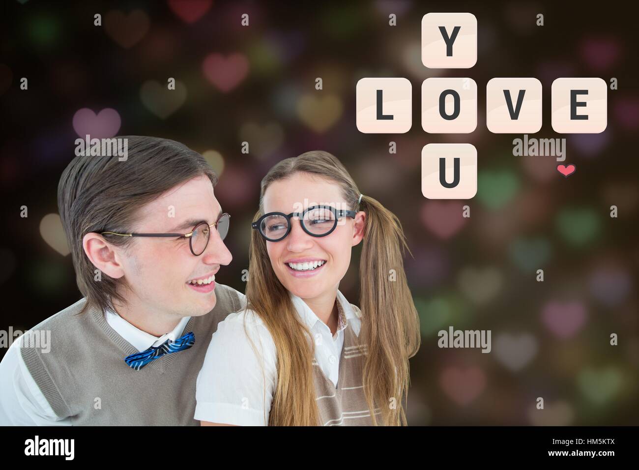 Happy couple smiling at each other Stock Photo - Alamy