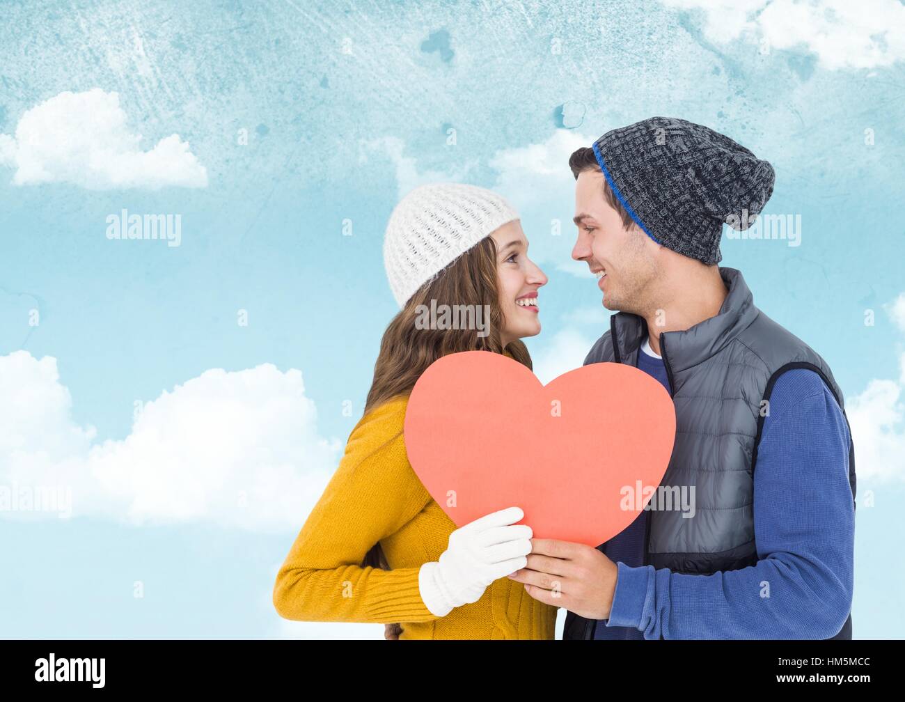 Romantic couple holding heart shape Stock Photo - Alamy