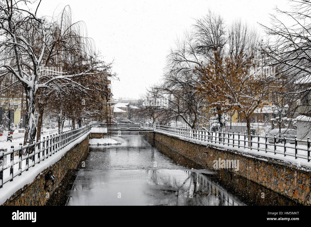 Picturesque winter scene by the river of Florina, a small town in ...