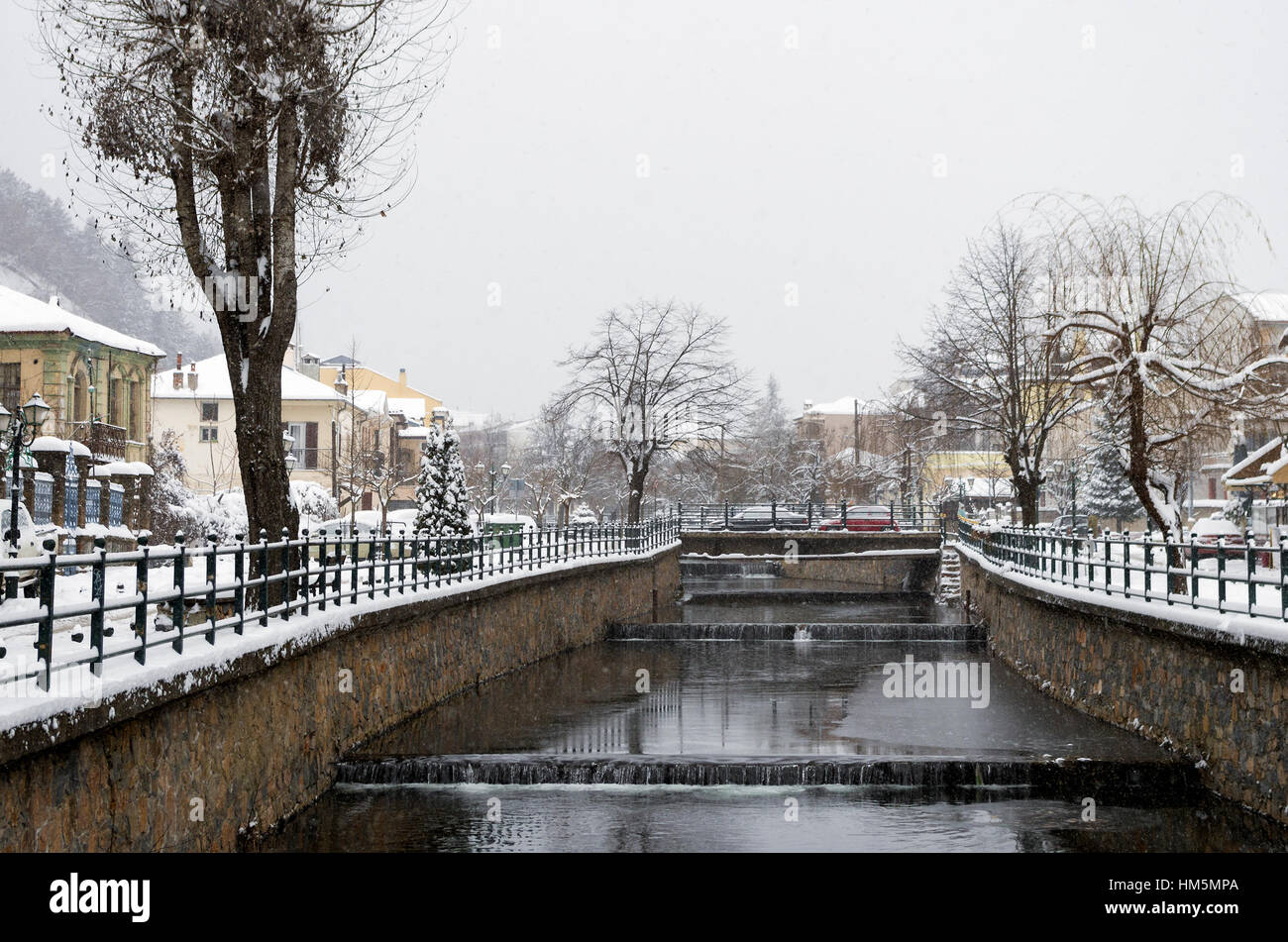 Picturesque winter scene by the river of Florina, a small town in ...