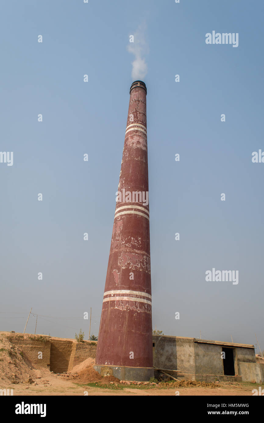 Chimney of a brick making machine Stock Photo - Alamy