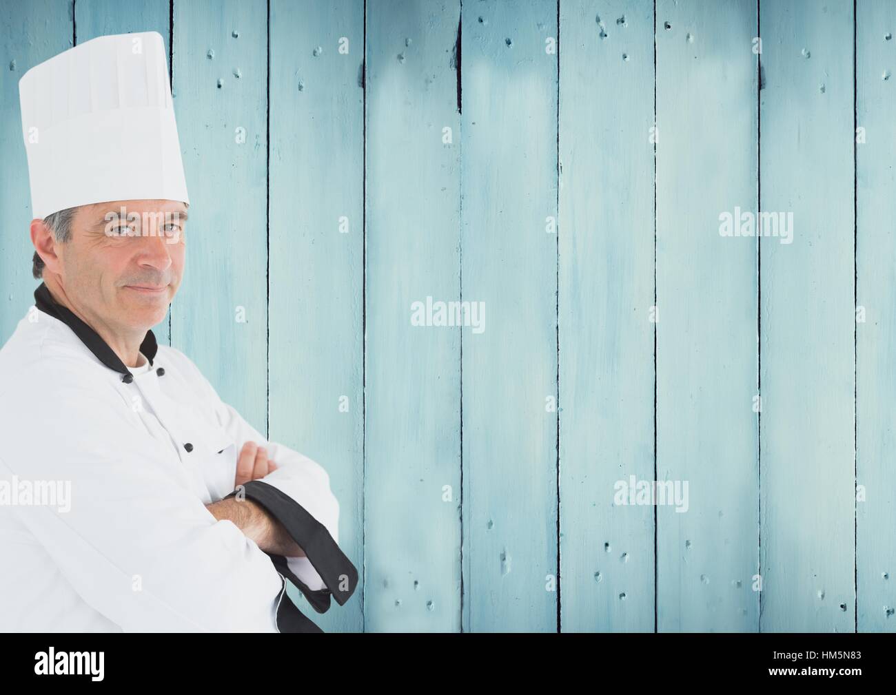 Male chef standing arms hi-res stock photography and images - Alamy