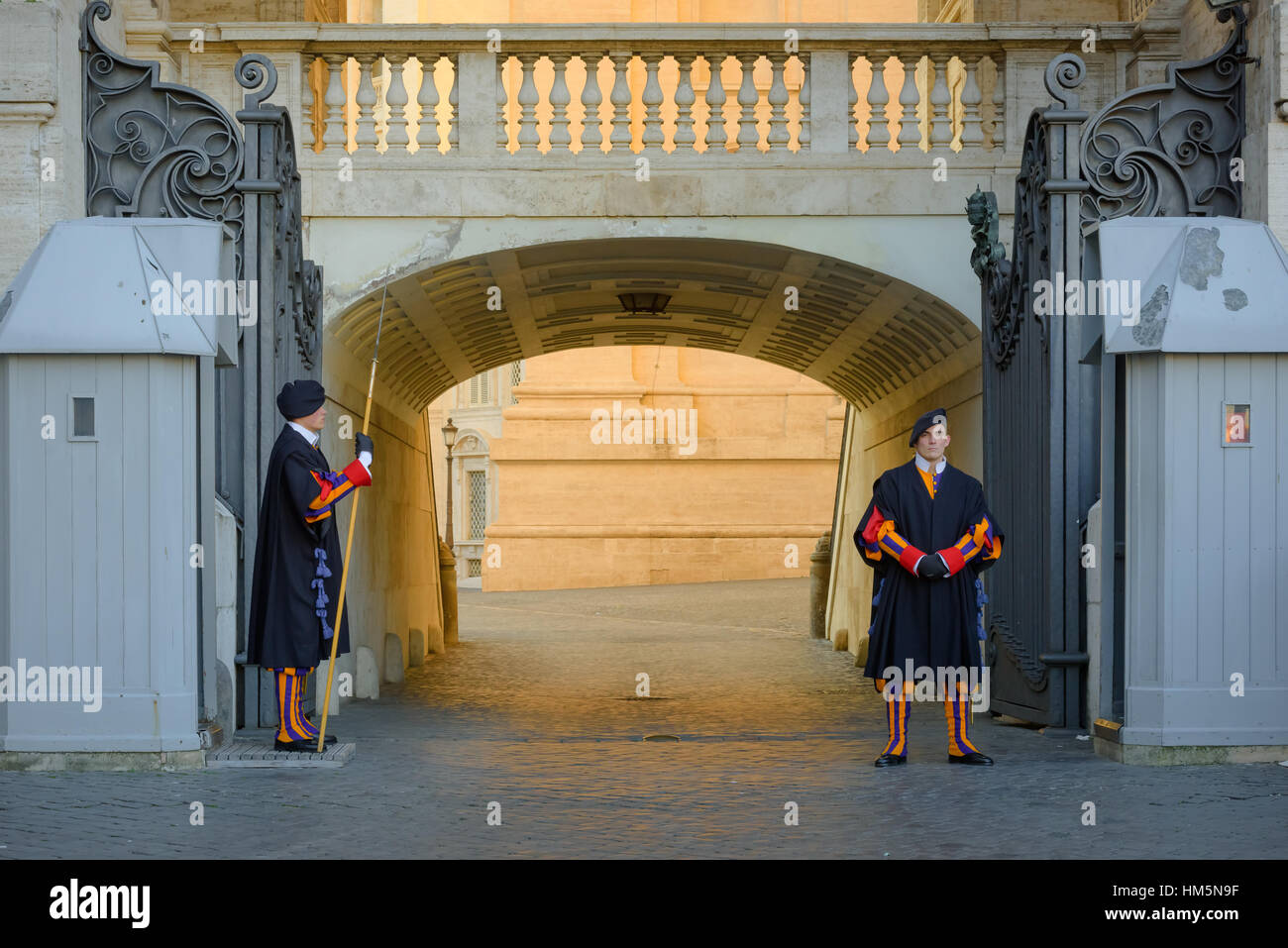Two members of the Swiss Guard at Saint Peter's Basilica stand guard at ...