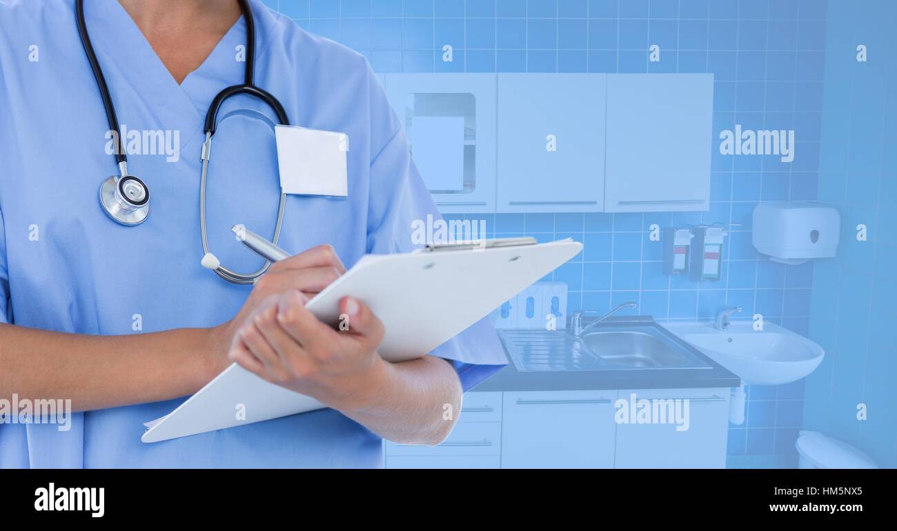 Mid section of doctor writing on clipboard Stock Photo - Alamy
