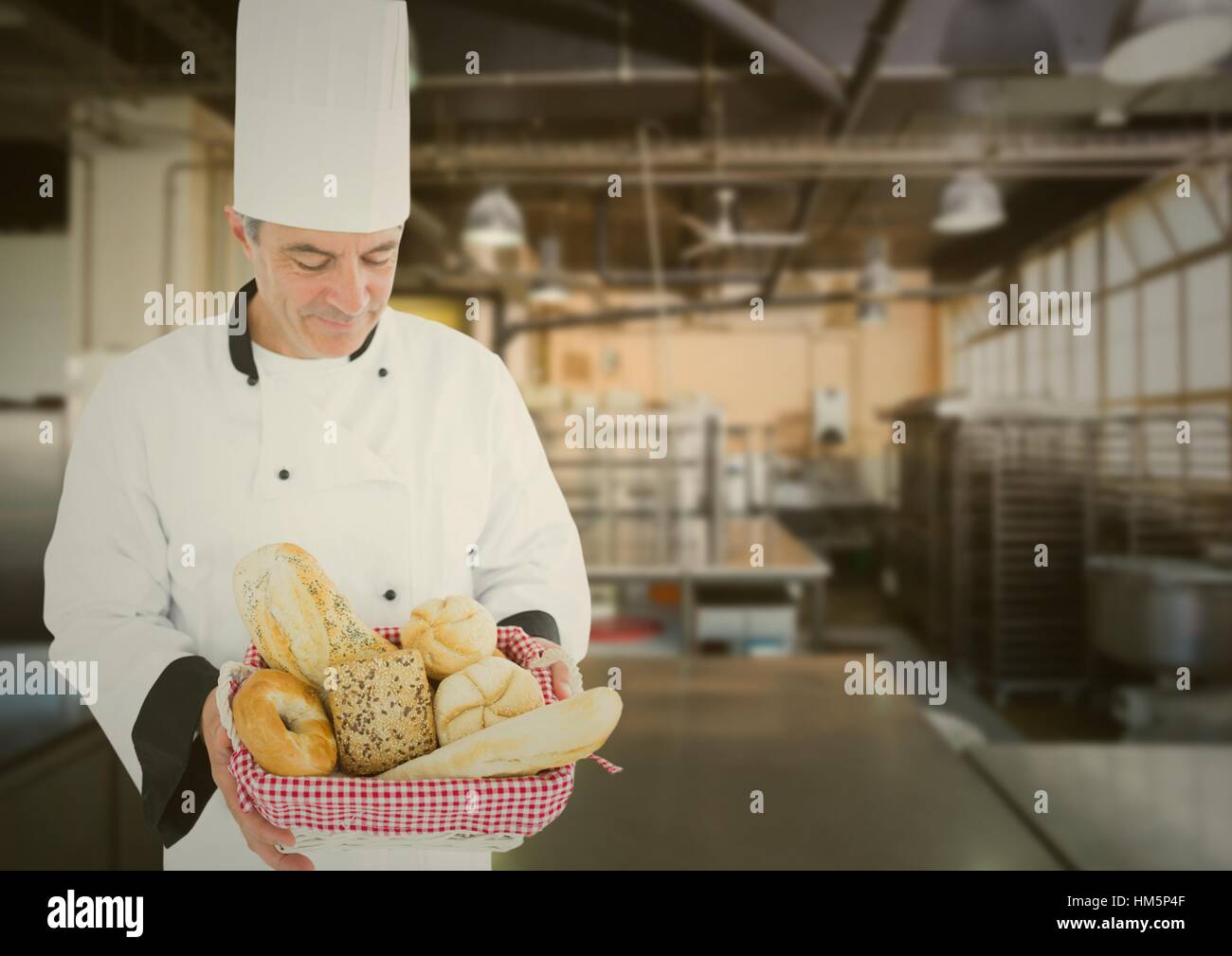 Male chef holding various bread loafs in bakery Stock Photo - Alamy